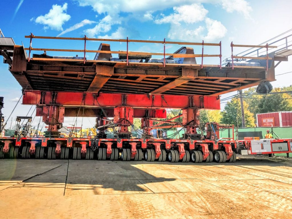 Self-Propelled Modular Transporters